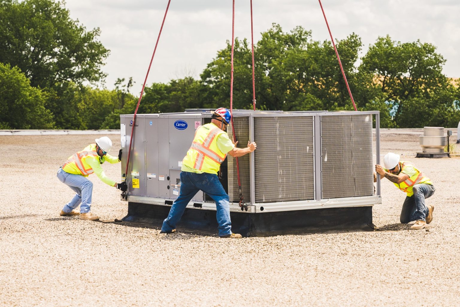 Hutchinson Utilizes Helicopter Lift for 17 HVAC Unit Install ...